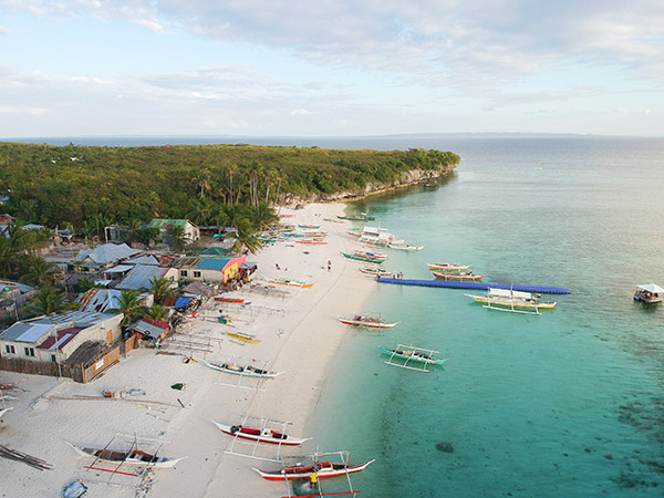 A Travel Guide to Kinatarcan (Guintacan) Island: The Rise of the Once ...