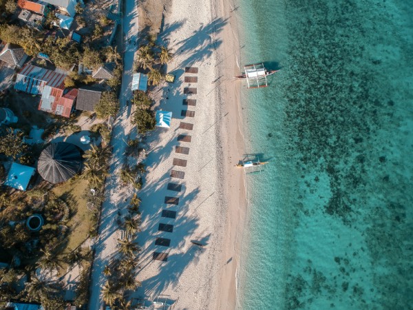 A Travel Guide to Kinatarcan (Guintacan) Island: The Rise of the Once ...